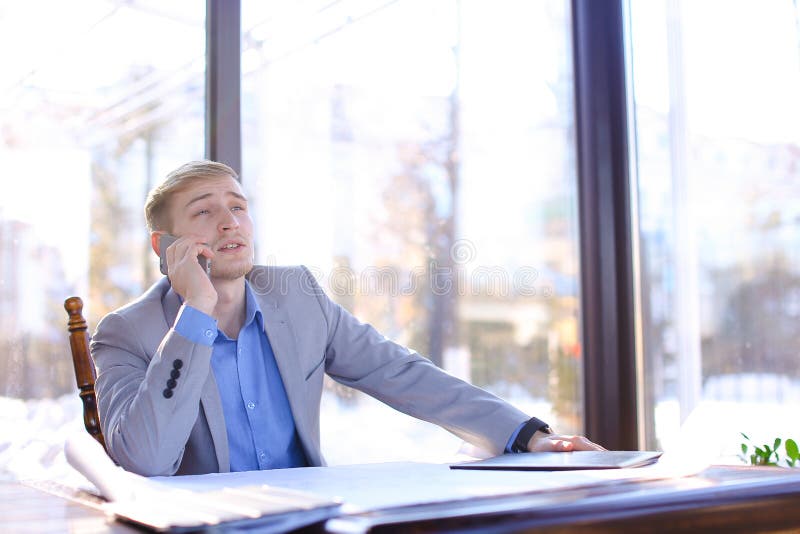 Architect Calling Customer by Smartphone and Asking about Projec Stock ...