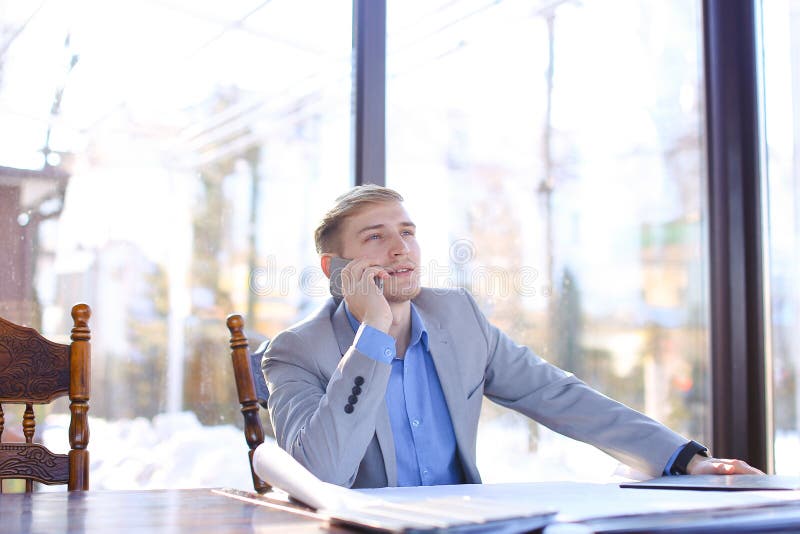 Architect Calling Customer by Smartphone and Asking about Projec Stock ...