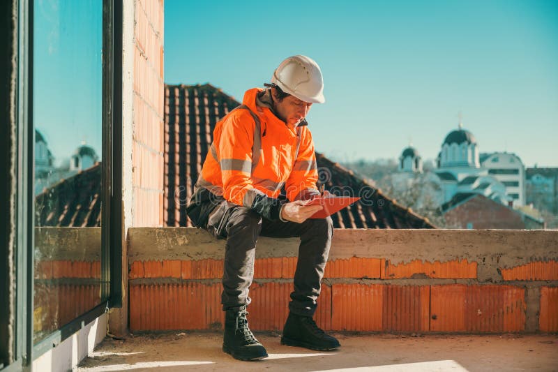 Architect and Construction Engineer Making Notes and Remarks during ...