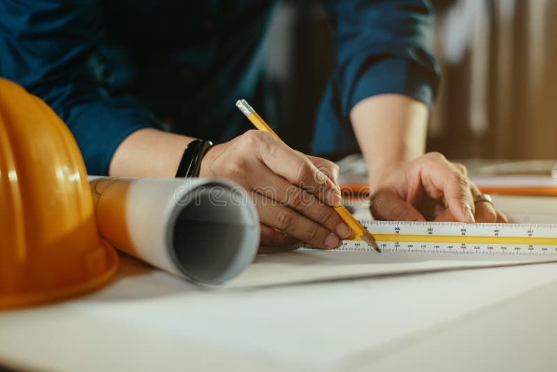 Architect Construction Engineer Plan on Hard Project at Work Stock ...