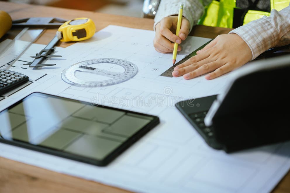 Architect Construction Engineer Plan on Hard Project at Work Stock ...