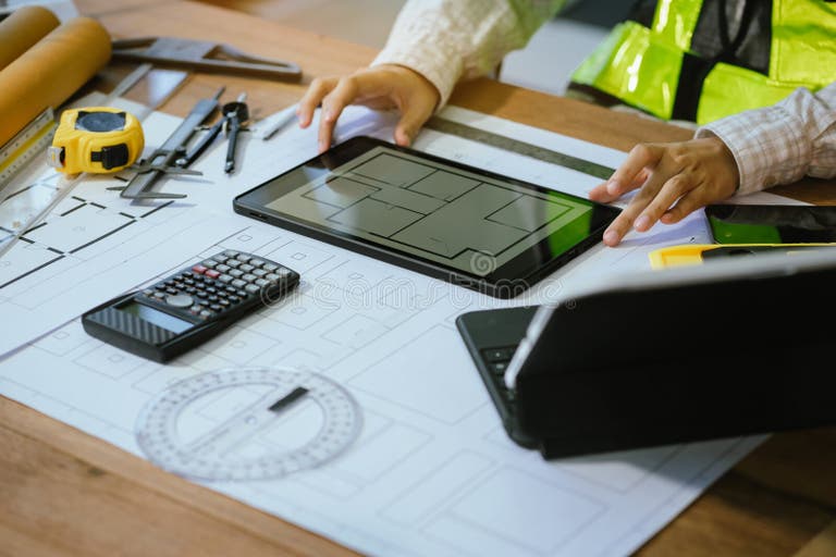 Architect Construction Engineer Plan on Hard Project at Work Stock ...