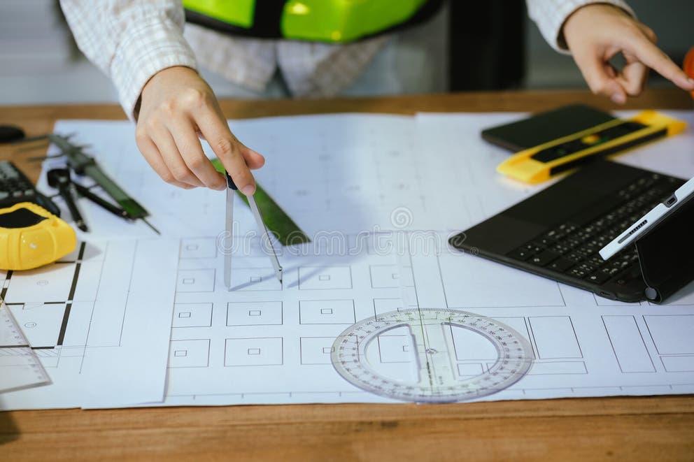 Architect Construction Engineer Plan on Hard Project at Work Stock ...