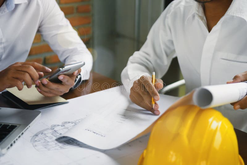 Architect Construction Engineer Plan on Hard Project at Work Stock ...