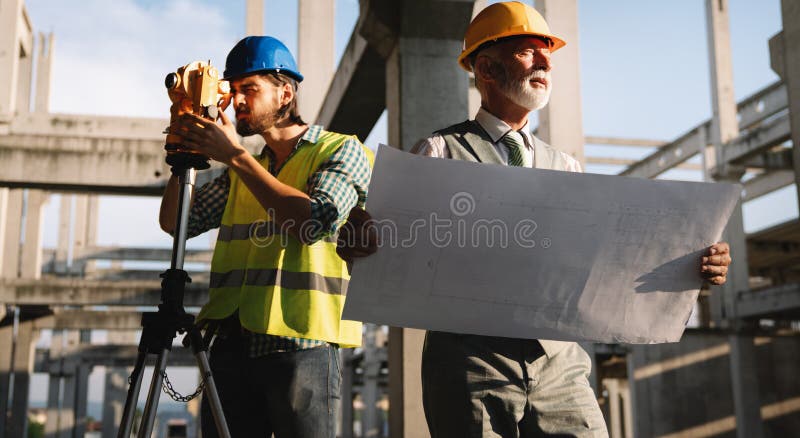 Architect and Construction Engineer or Surveyor Discussion Plans and ...