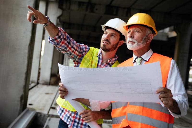 Architect and Construction Engineer or Surveyor Discussion Plans and ...