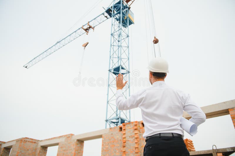 Architect at a Construction Site with Blueprints Stock Image - Image of ...