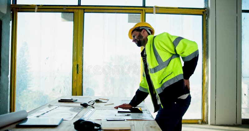 Architect, Construction Worker and Back Pain with Drawing, Plans and ...