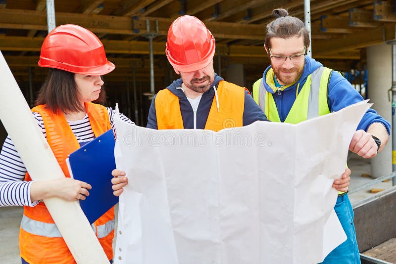 Architect and Craftsman Team with Construction Drawing Stock Image ...