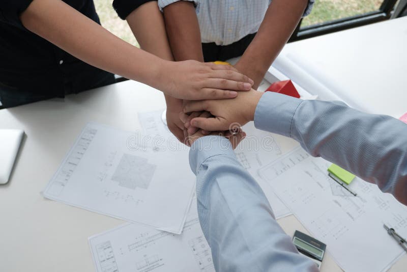 Architect & Customer Joining Hands. Engineer Put Hand Together W Stock ...