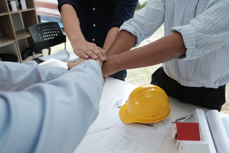 Architect & Customer Joining Hands. Engineer Put Hand Together W Stock ...