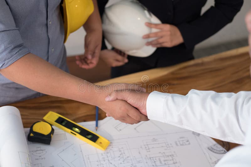 Architect & Customer Shaking Hands. Engineer Handshaking with Pa Stock ...