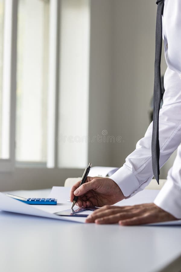 Draftsman at Work, Analyzing Documents for Drafting. Closeup of Graph ...