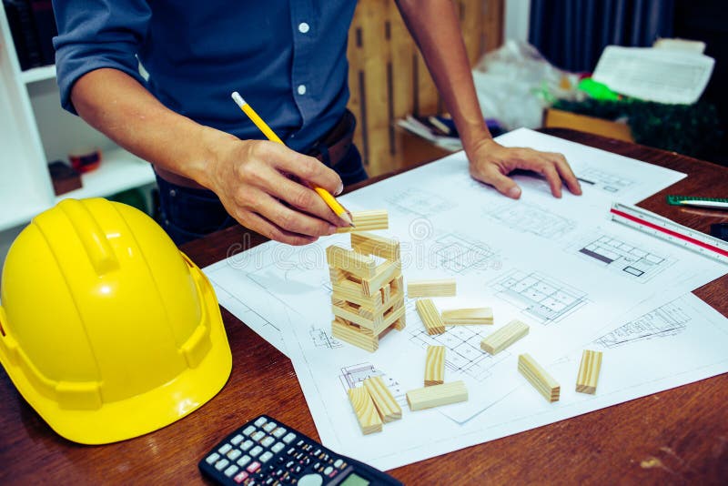 Architect Designing Project on the Desk in Construction Site.concept ...
