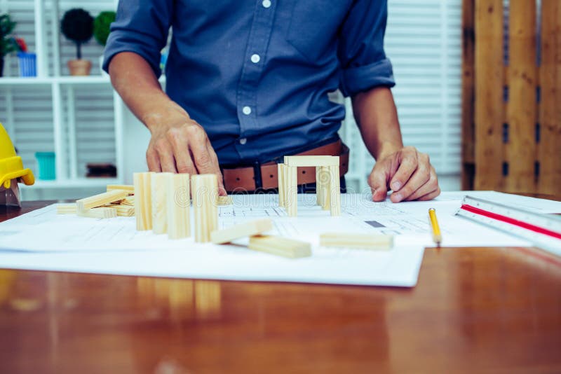 Architect Designing Project on the Desk in Construction Site.concept ...