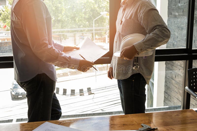 Architect Discuss with Engineer about Project Stock Photo - Image of ...