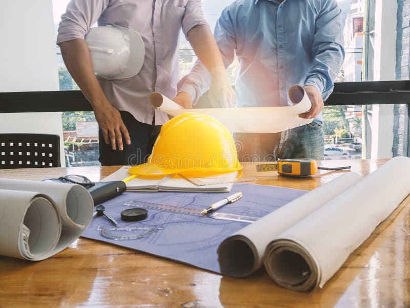 Architect Discuss with Engineer about Project in Office Stock Photo ...