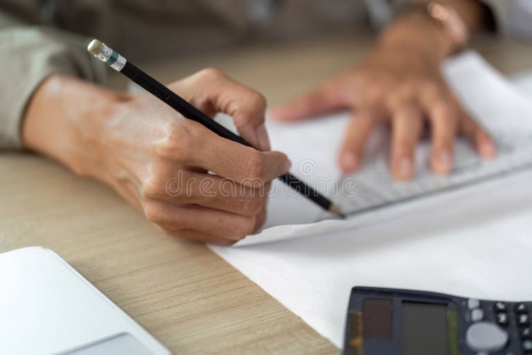 Architect Drafting Plans with Pencil on Workspace Stock Image - Image ...
