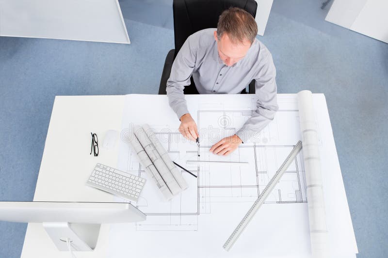 Architect Drawing on Blueprint Stock Photo - Image of desk ...