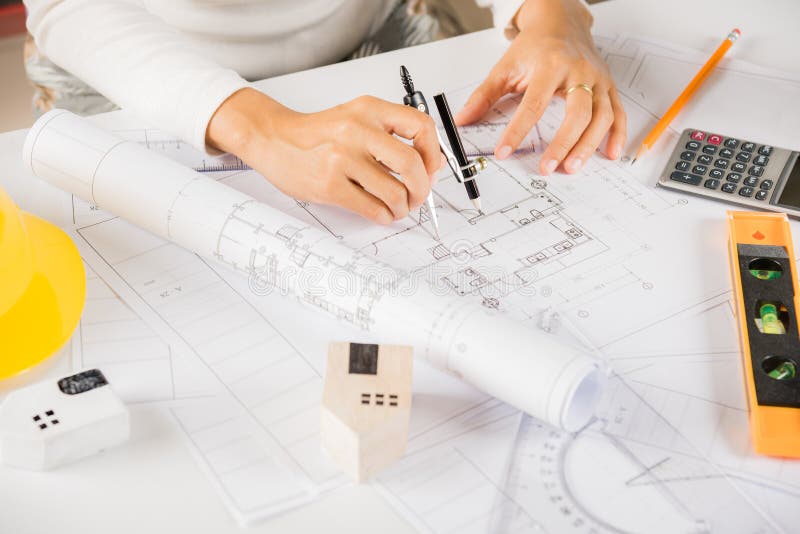 Architect Drawing with Divider Compass on House Plan Blueprint Paper ...