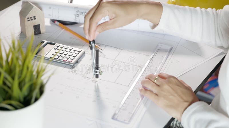 Architect Drawing with Ruler on House Plan Blueprint Paper for Repair ...