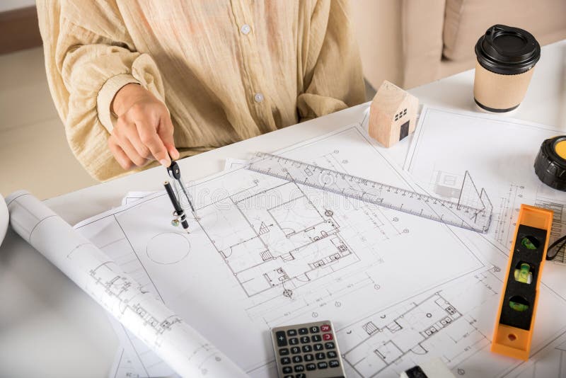 Architect Drawing with Divider Compass on House Plan Blueprint Paper ...