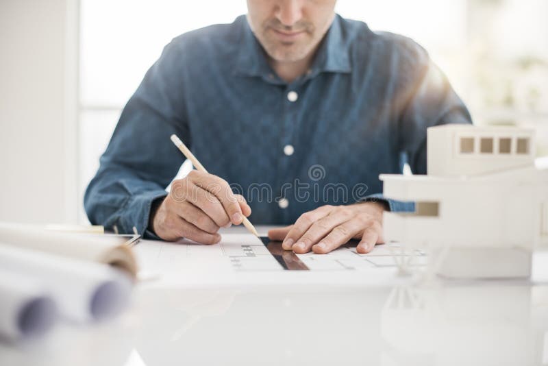Architect Drawing on a Draft Project Stock Image - Image of pencil ...
