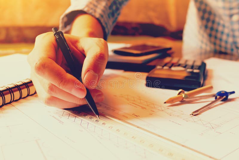 Architect Drawing on Project Blueprint and Working Design. Stock Photo ...