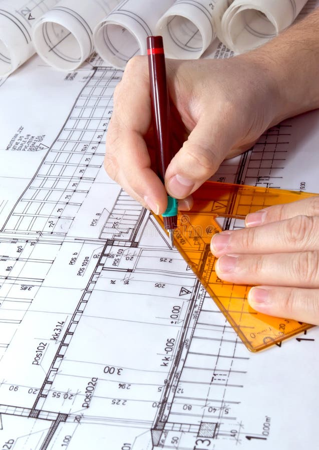 Architect Drawing Rolls and Plans Blueprints Stock Image - Image of ...