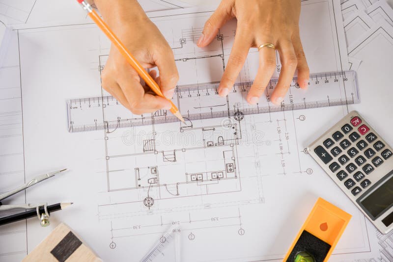Architect Drawing with Ruler on House Plan Blueprint Paper for Repair ...