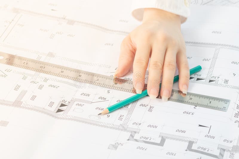 An Architect Draws a Plan in an Architectural Studio at a Desk Stock ...