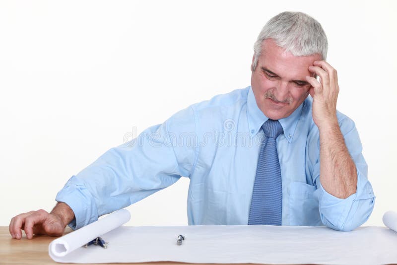 Architect Dubious of His Plans. Stock Image - Image of executive, plan ...
