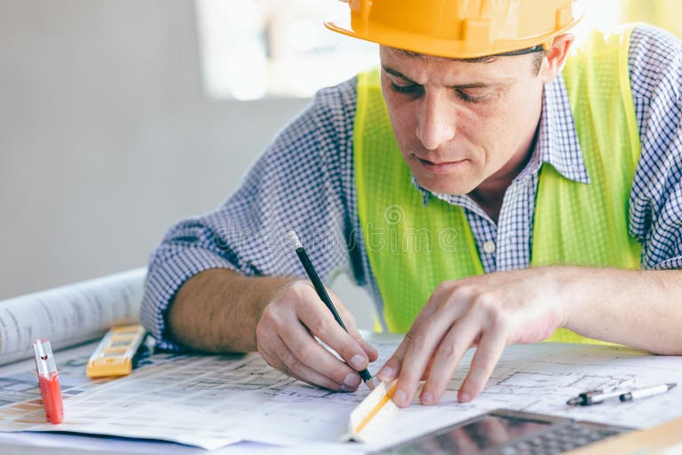 Architect Engineer Builder, Building Designer Working with Floorplan at ...