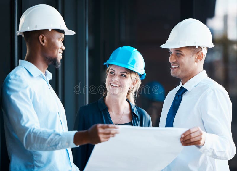 Architect, Engineer and Building Contractor Looking at Plans or ...