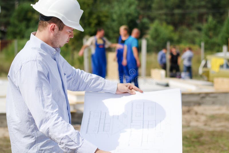Woman Engineer, Architect or Contractor Works on Plans Stock Photo ...