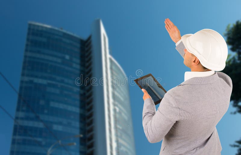 Architect or Engineer Checking a Skyscraper Stock Photo - Image of ...