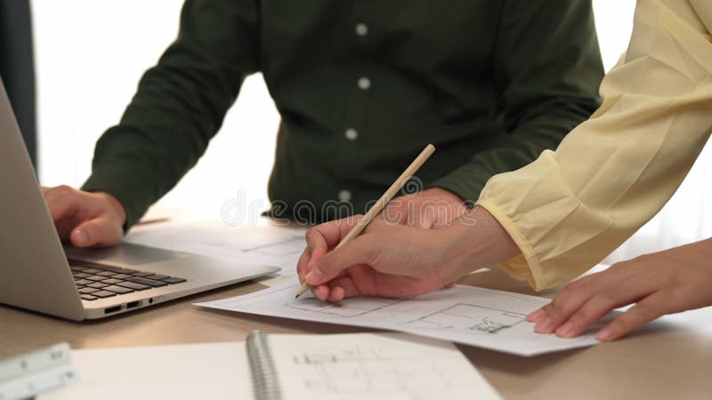 Architect Compare Hand Writing with Blueprint Detail with Laptop ...