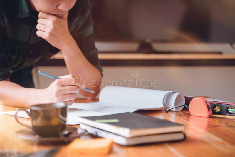 Architect Engineer Design Working Planning Project with a Blueprint in ...