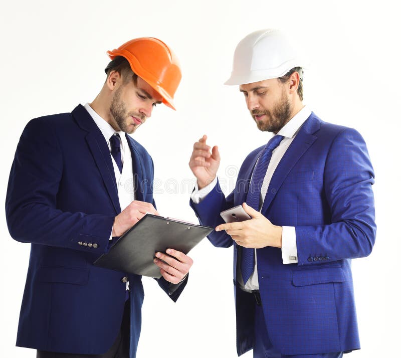 Architect and Engineer Discuss Project. Business Partners Look at ...