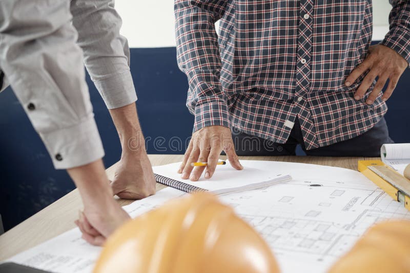 Architects discussing work stock image. Image of construction - 139978925