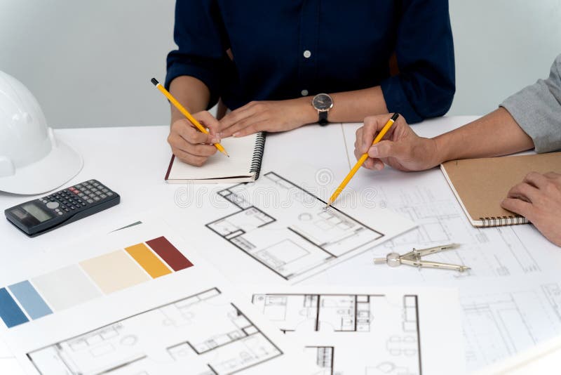 Architect and Engineer are Discussing and Viewing and Editing Plans ...