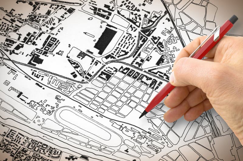 Architect or Engineer Drawing Over an Imaginary City Map of Territory ...