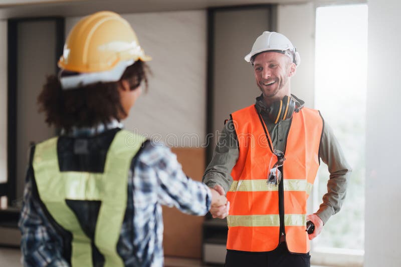 Architect or Engineer and Foreman Construction Workers Shaking Hands ...