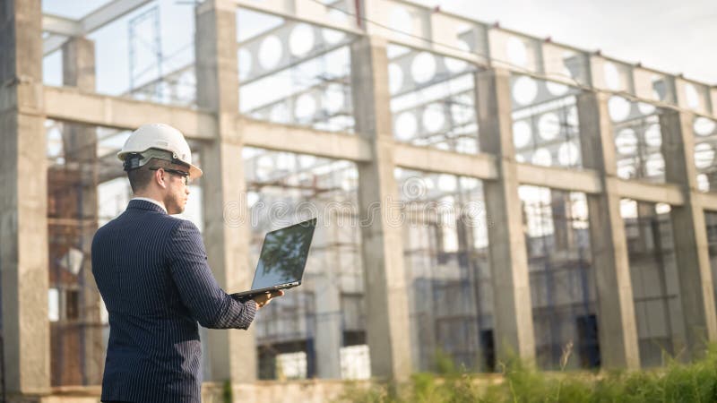 An Architect Engineer Inspecting the Building Construction and Check ...