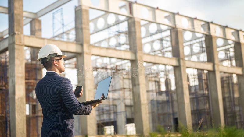 An Architect Engineer Inspecting the Building Construction and Check ...