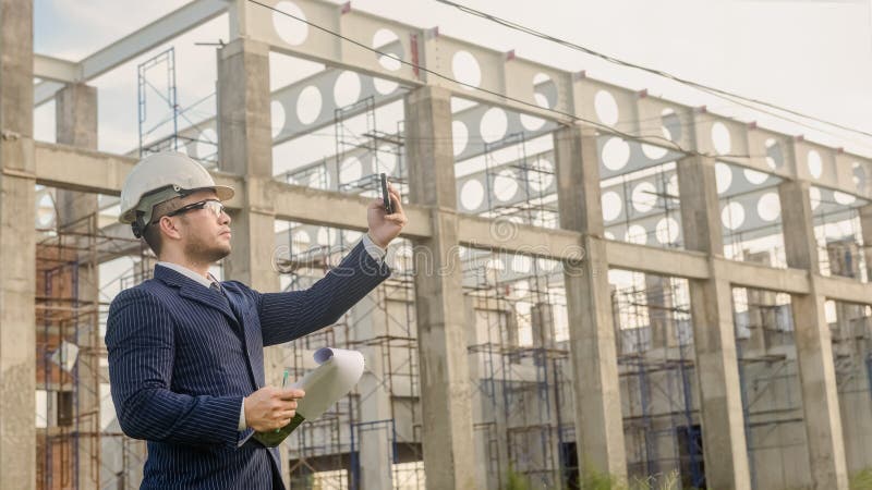 An Architect Engineer Inspecting the Building Construction and Check ...
