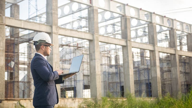 An Architect Engineer Inspecting the Building Construction and Check ...
