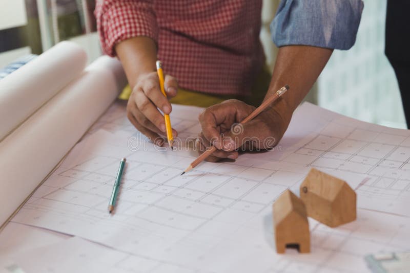 Architect or Engineer Meeting, Working with Blueprints in Office Stock ...