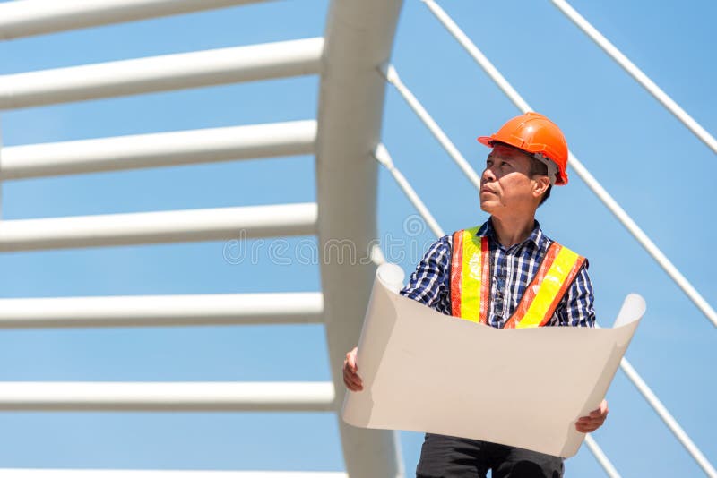 Architect Engineer Planning Blue Print in Construction City Site Stock ...