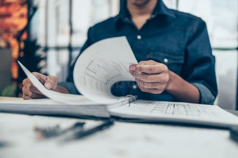 Architect Engineer Read Drawing Design Working on Blueprint. House ...